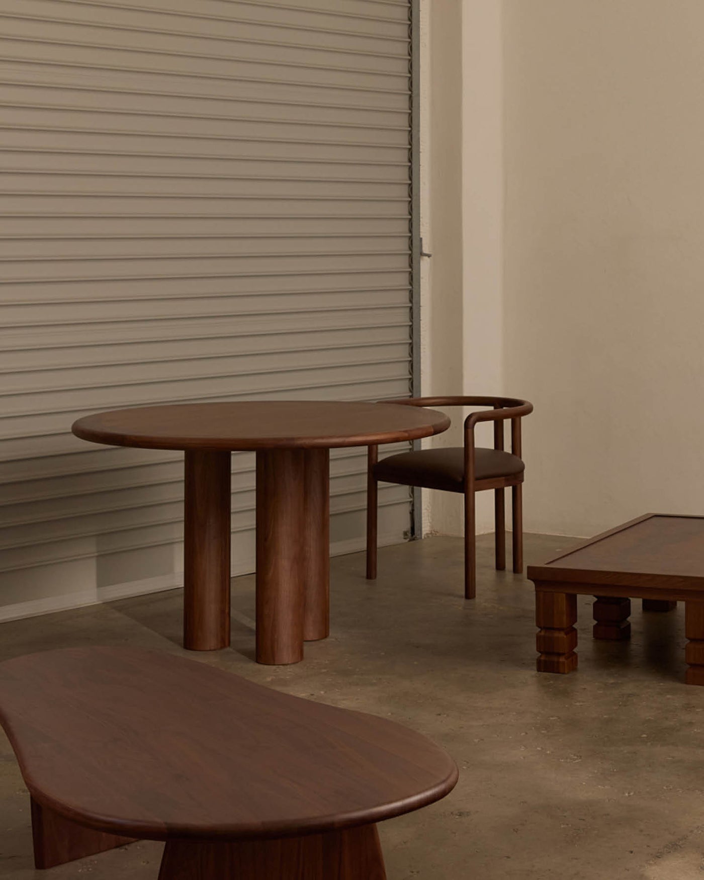 Elio Small Round Dining Table Walnut | by Fleur Studios