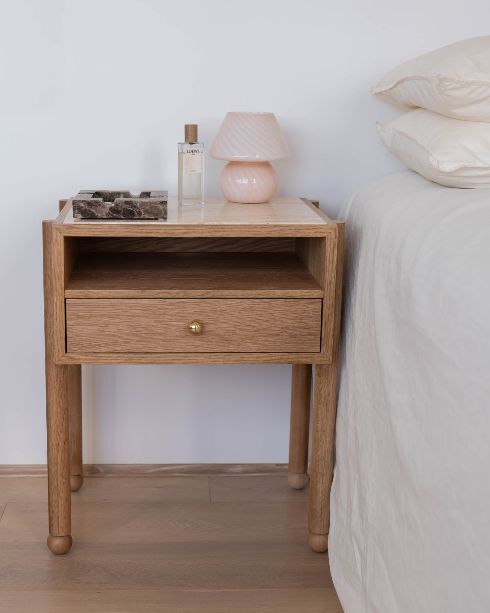 Naomi Oak Travertine Bedside Table | by Fleur Studios